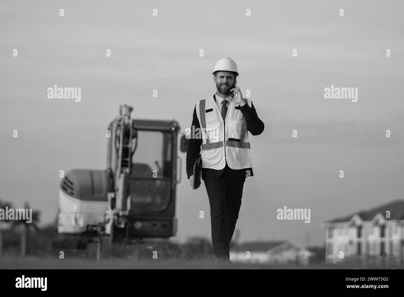 man of architect occupation speaking on phone outdoor. engineer man of ...