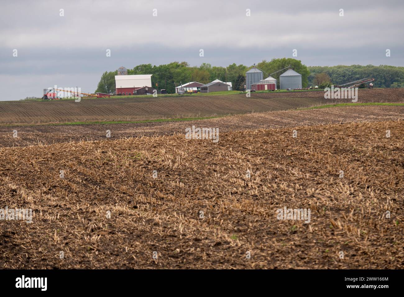Joice; Iowa. Farm and field showing farm equipment and one field ready ...