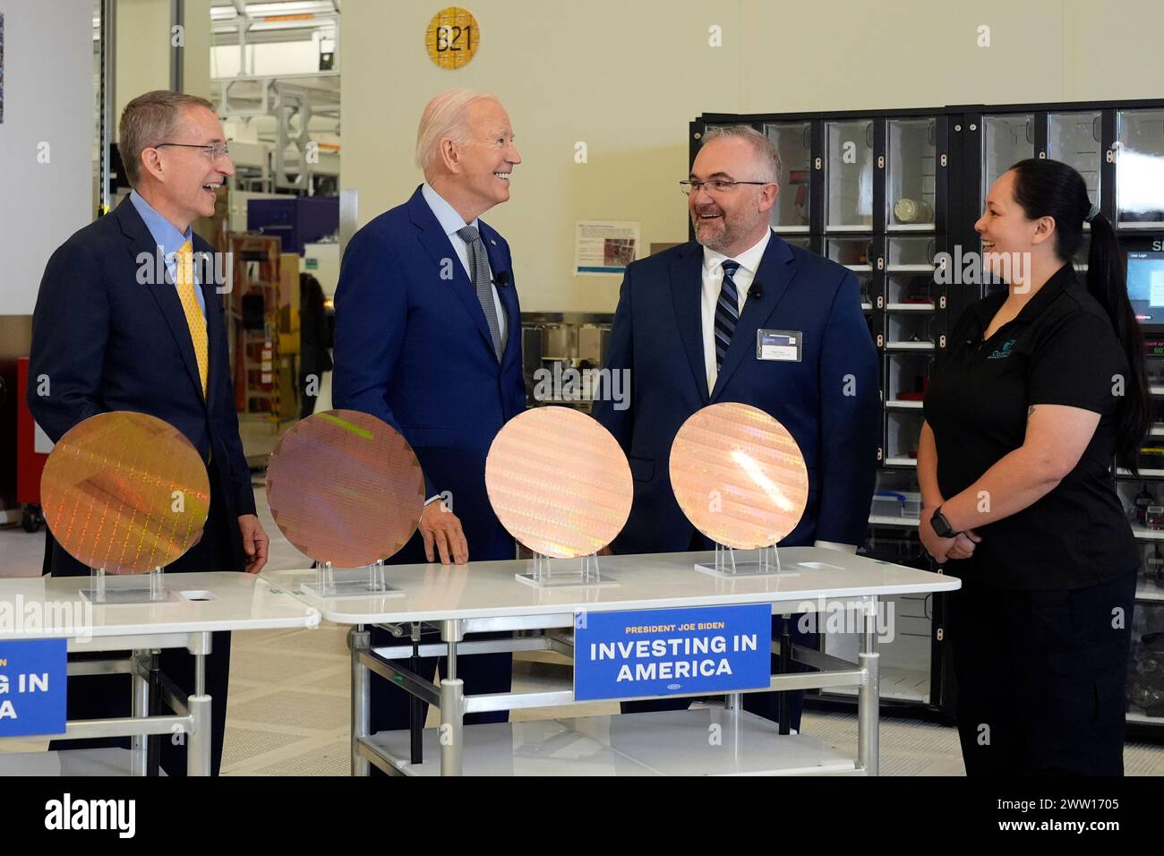 President Joe Biden listens to Intel CEO Pat Gelsinger, left, as Intel ...
