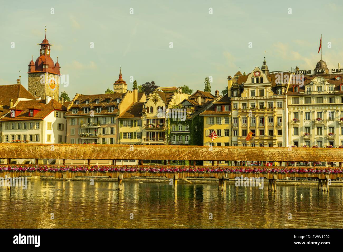 Chapel Bridge With Flowers and Luxury Hotel in City of Lucerne and ...