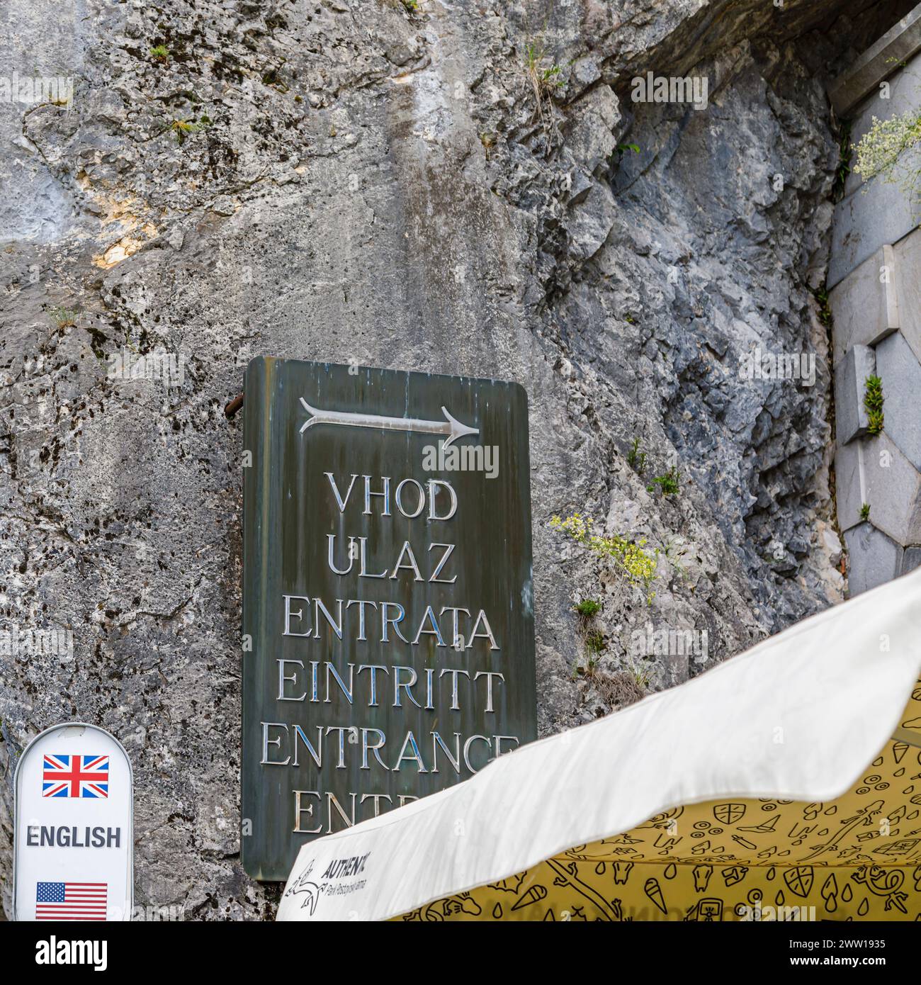 English entrance queue sign at Postojnska Jama (Postojna Cave Park), an ...