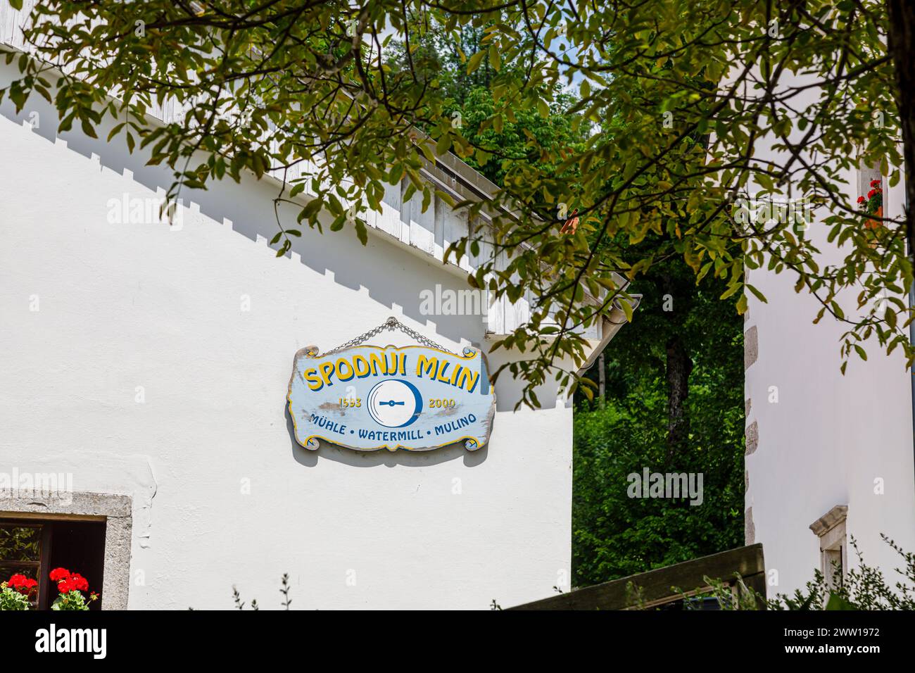 Name sign at the historic Modrijan Homestead Mill on Pivka River in ...