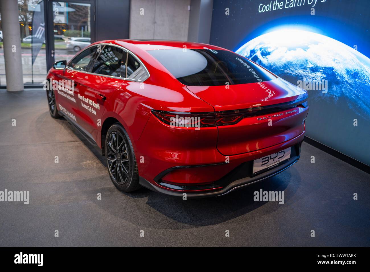 new red BYD Han EV 3.95, rear view, Electric Vehicle Chinese manufacturer in Studio, elegance ...