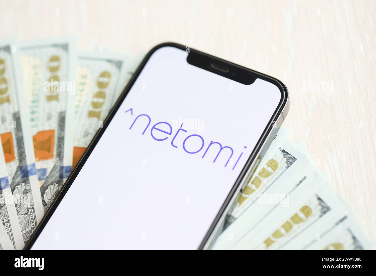 KYIV, UKRAINE - MARCH 17, 2024 Netomi logo on iPhone display screen ...