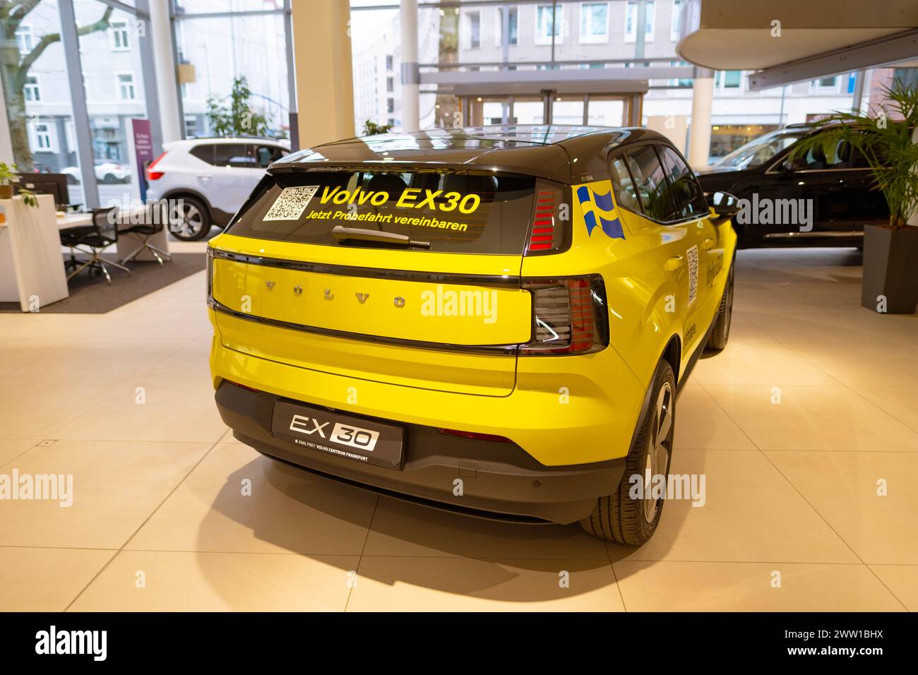 new vibrant yellow Volvo EX30 electric SUV, showcasing sleek design ...
