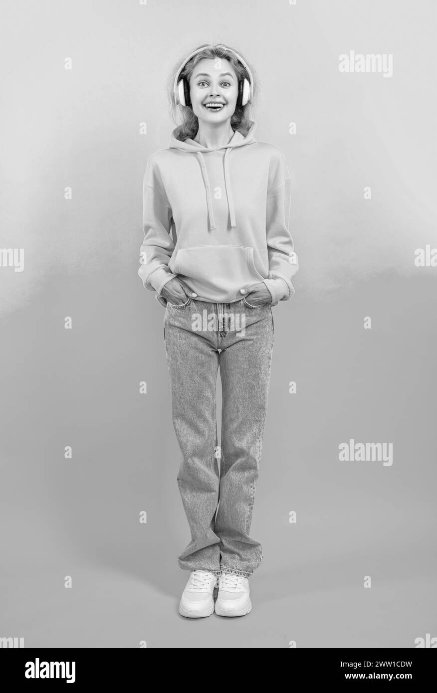 surprised millennial woman in studio. millennial woman on background ...