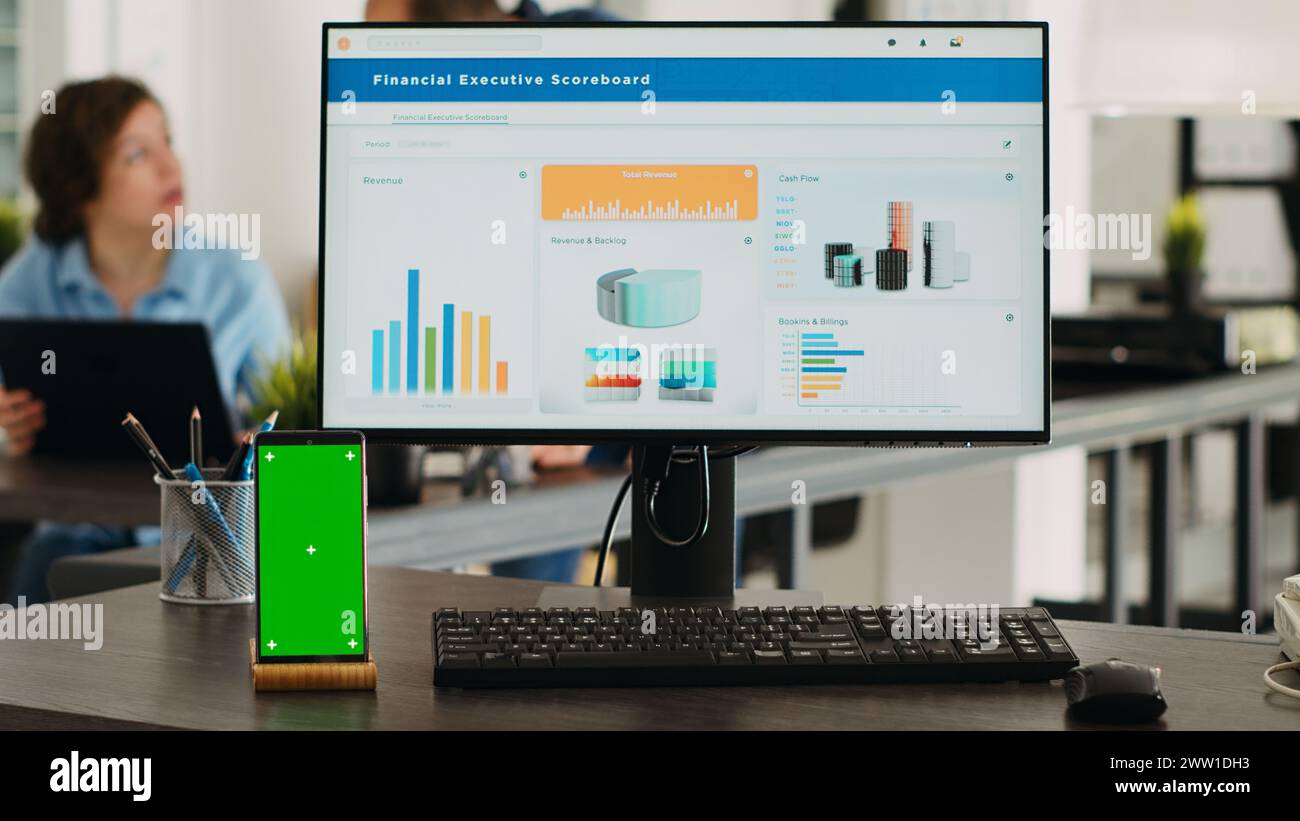 Empty Office Workstation With Greenscreen Running On Smartphone Display