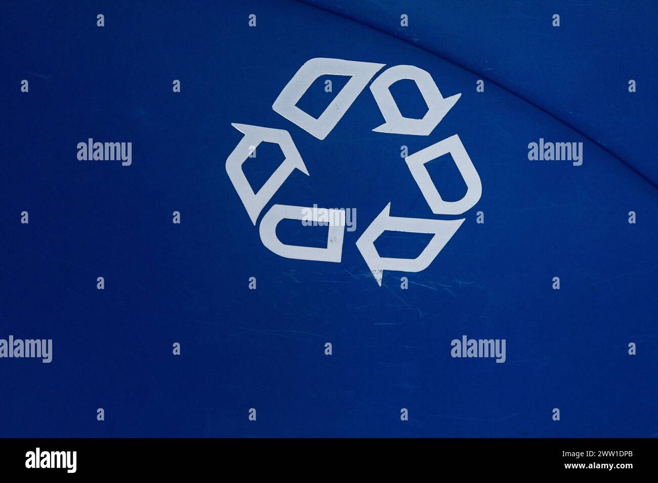 A recycling logo (mobius loop). If this logo is on a bin, the contents are suitable for ...