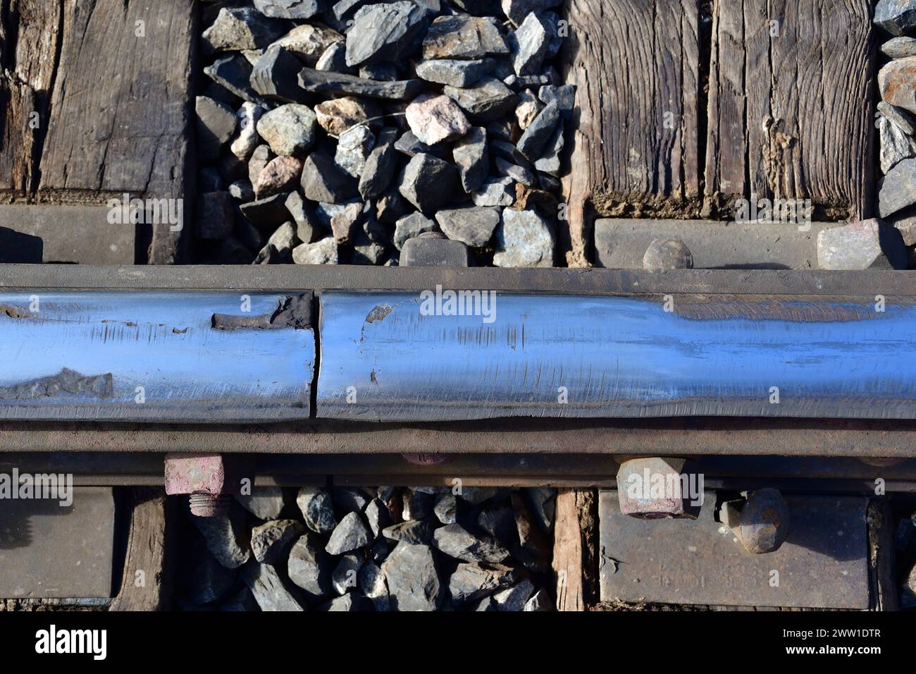 Damage to railroad. Metal track joint damage Stock Photo - Alamy