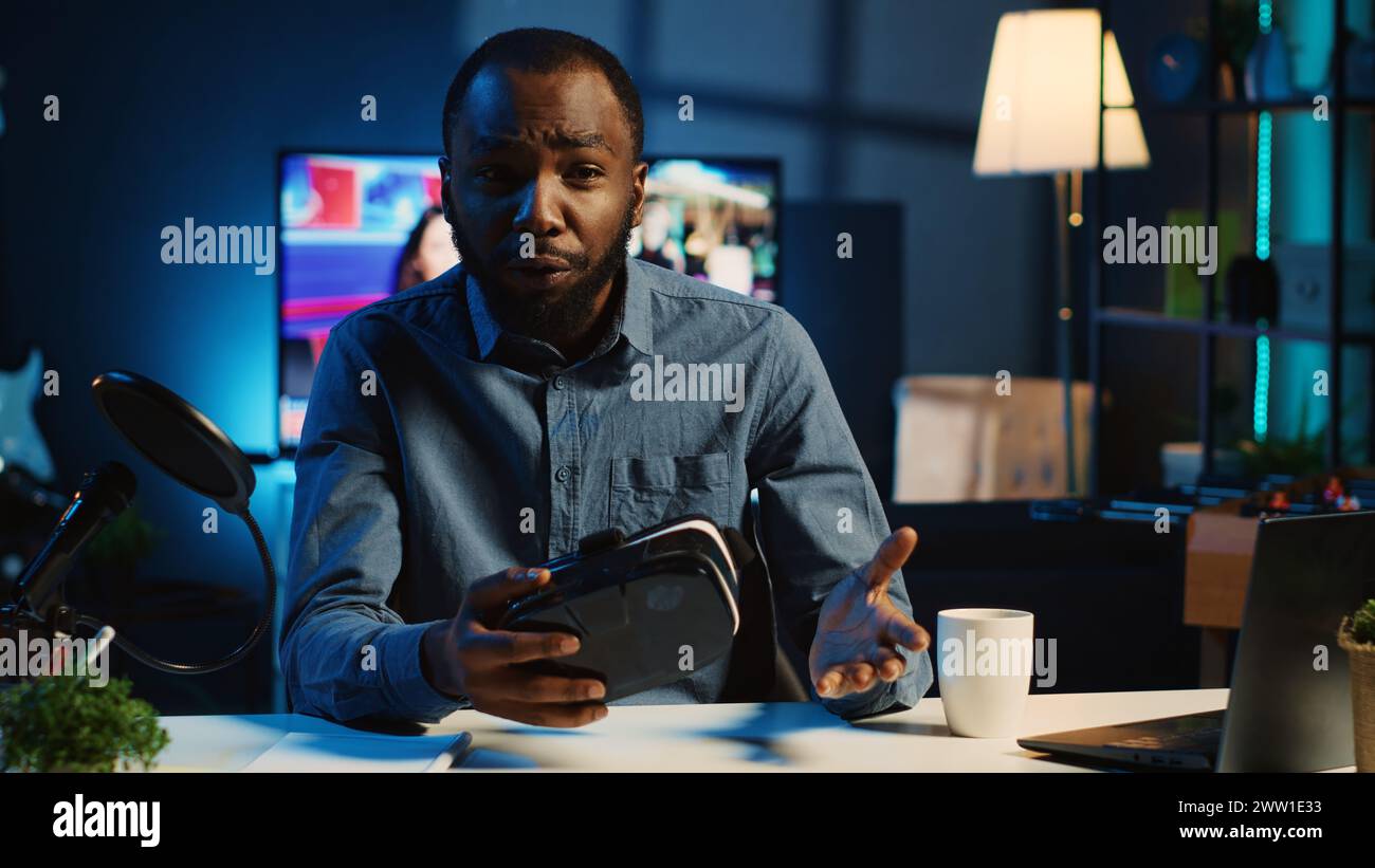 Tech content creator filming technology review of newly released VR ...