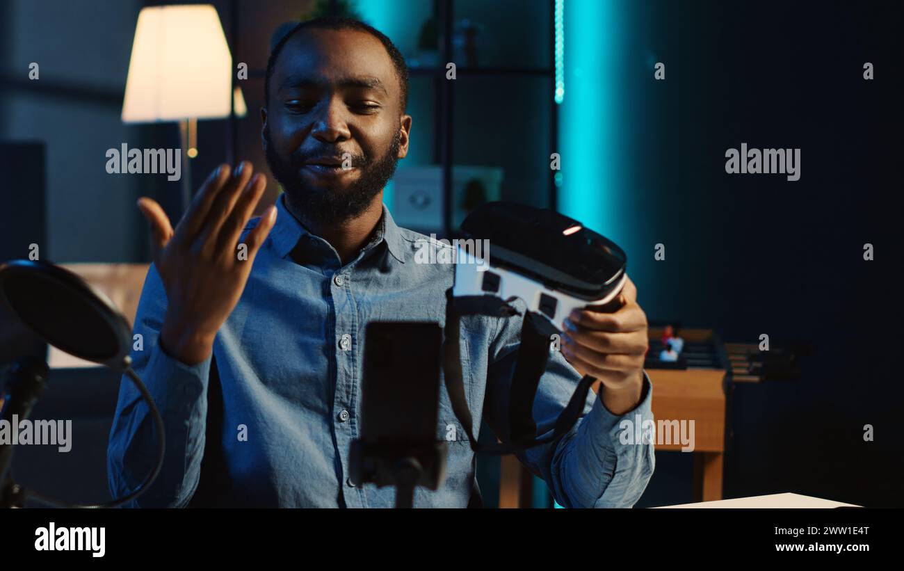 Tech content creator filming technology review of newly released gaming ...