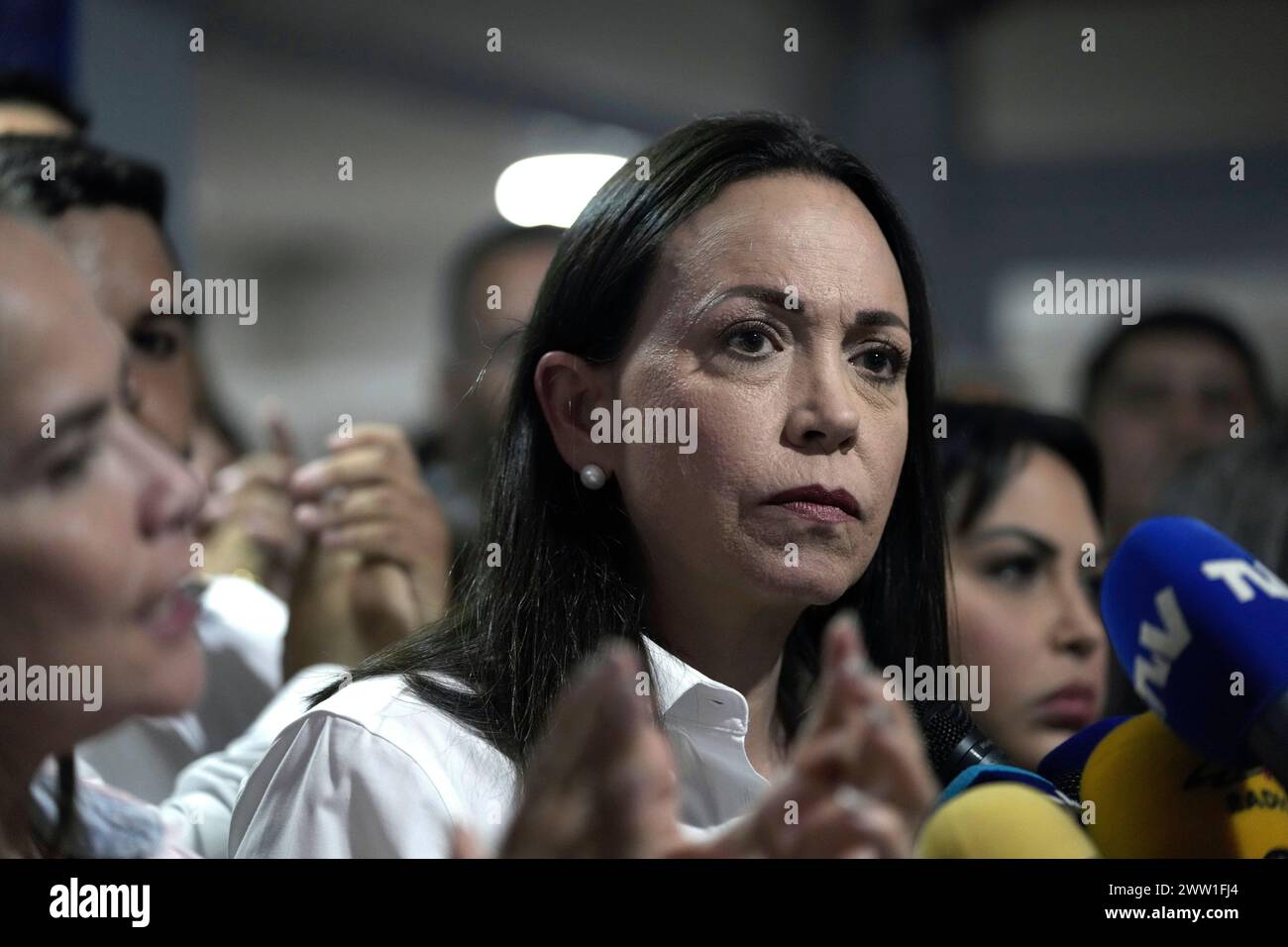 Opposition leader María Corina Machado pauses during a press conference ...