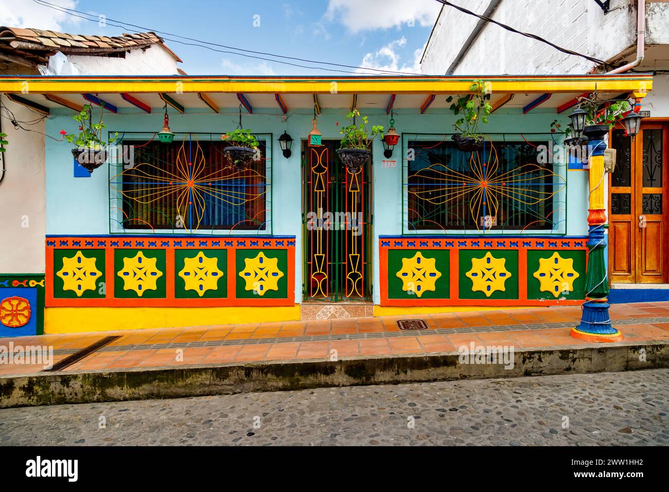 Colorful facade of a typical house in Guatape, Colombia Stock Photo - Alamy