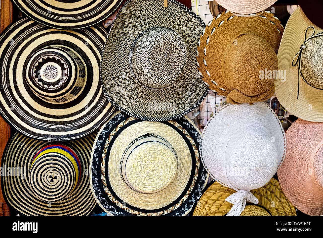 Typical Colombian hats hanging on a wall Stock Photo - Alamy