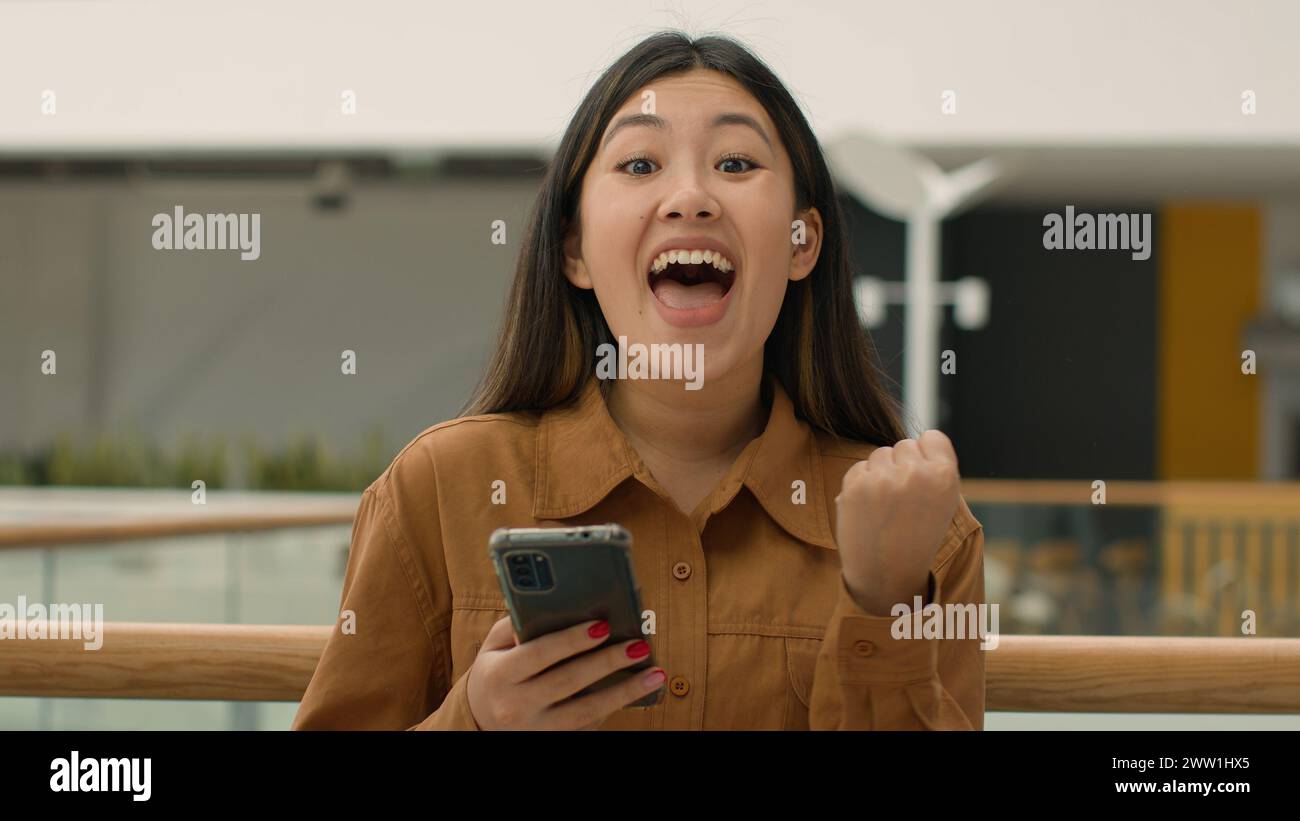 Shocked excited businesswoman client win online bet celebrate victory ...