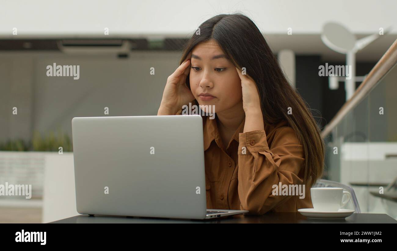 Exhausted overworked Asian chinese japanese woman student girl studying ...