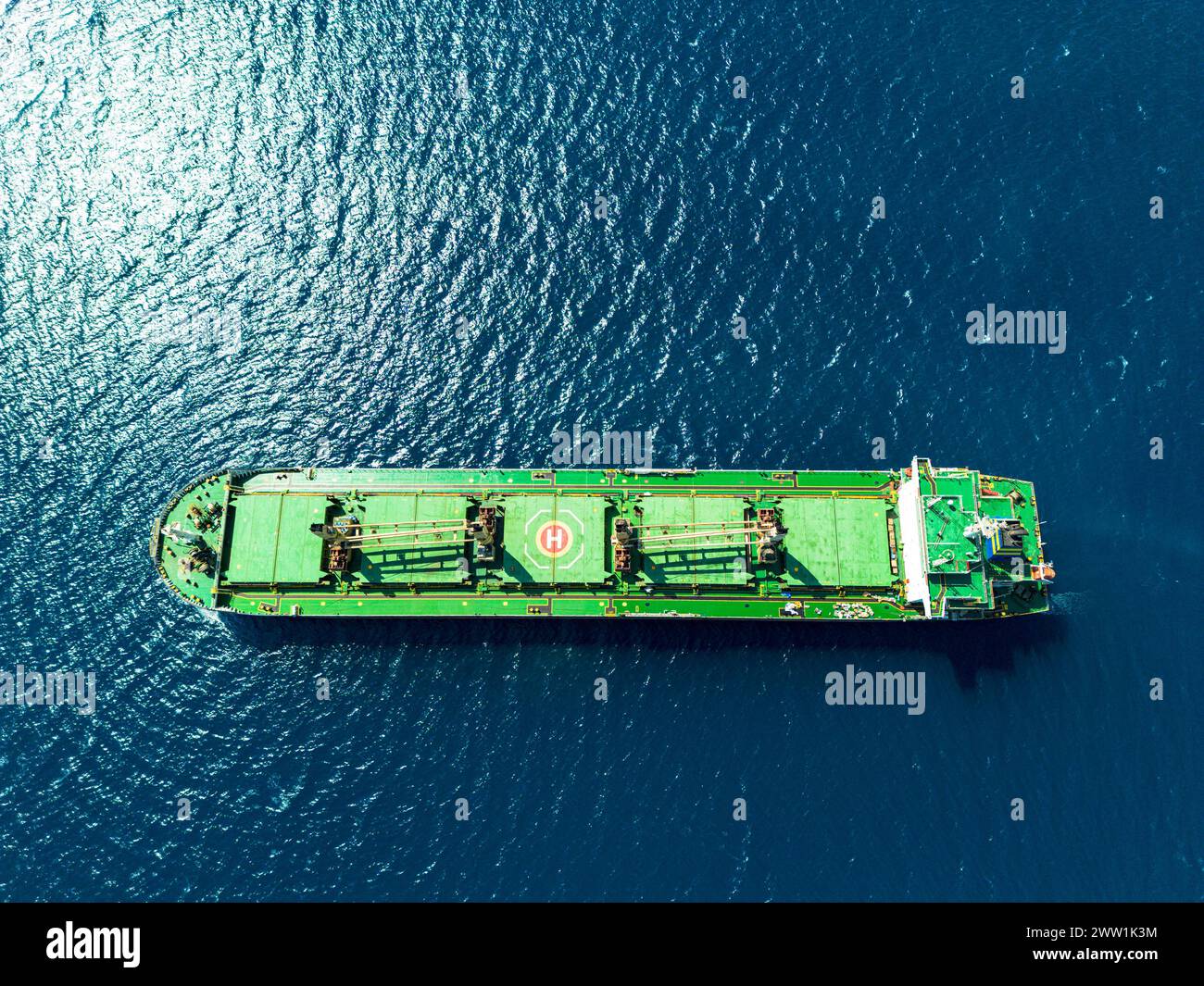 Aerial photo of huge bulk carrier tanker anchored in deep blue Aegean ...