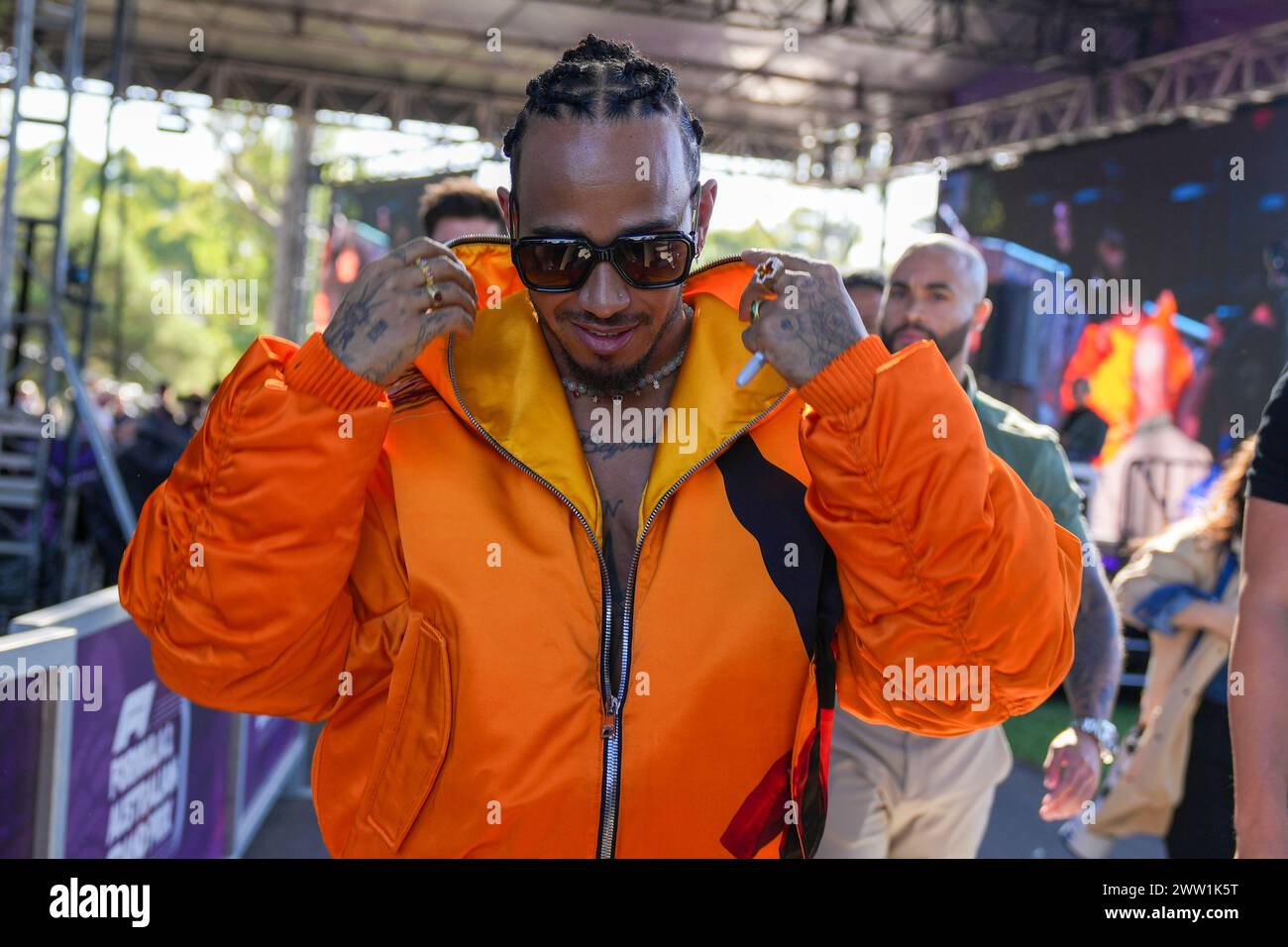 Mercedes driver Lewis Hamilton of Britain arrives at the Albert Park ...