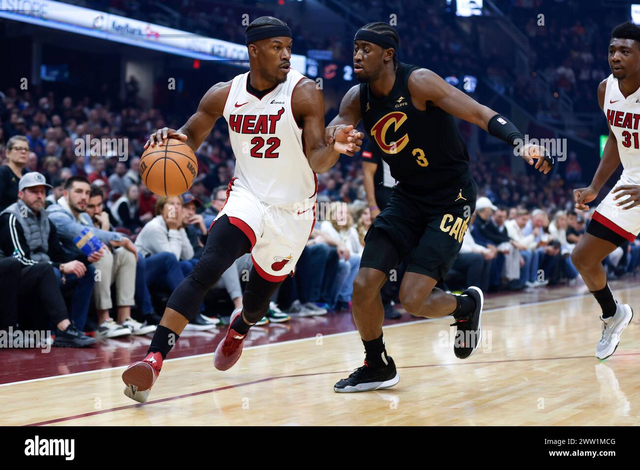 Miami Heat forward Jimmy Butler (22) drives against Cleveland Cavaliers ...