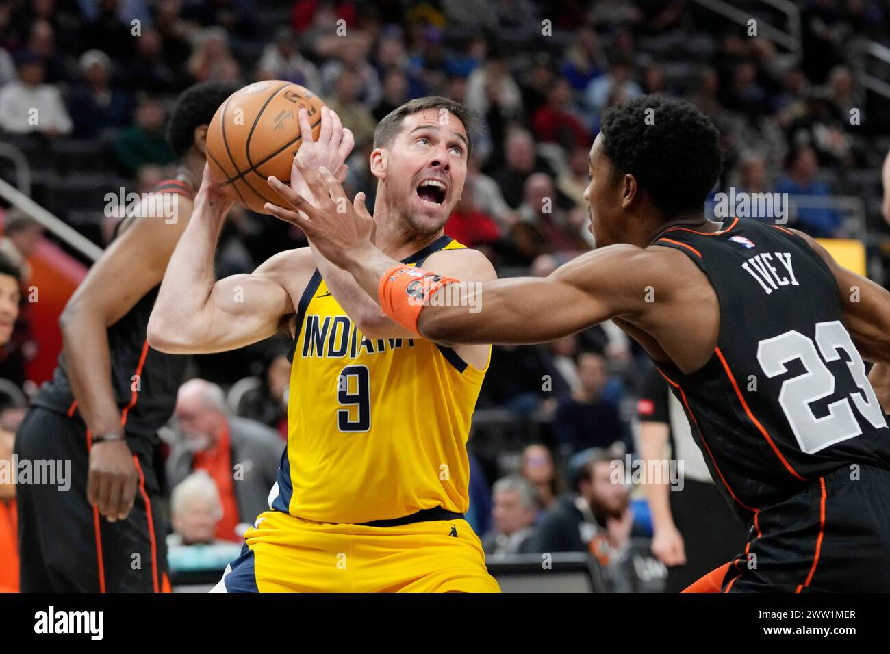 Detroit Pistons guard Jaden Ivey (23) reaches in on Indiana Pacers ...