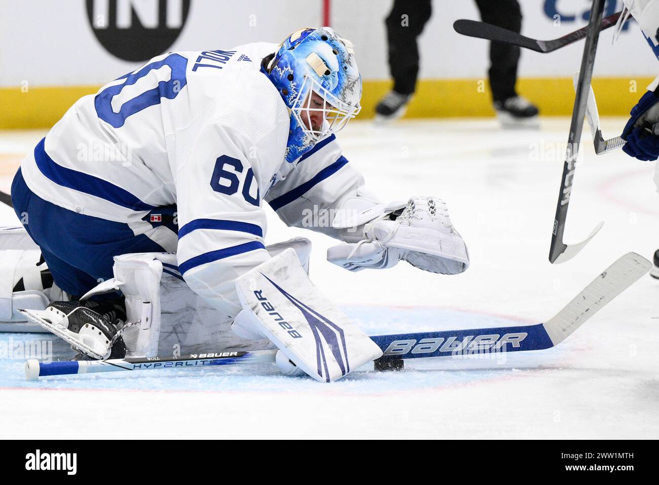 Toronto Maple Leafs goaltender Joseph Woll (60) covers the puck during ...