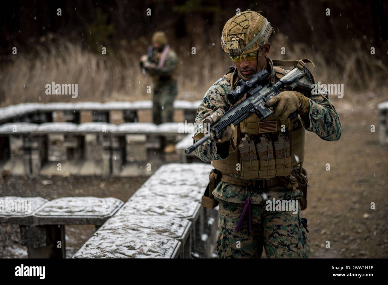 U.S. Marine Corps Lance Cpl. Jordan Batista executes a close-quarters ...