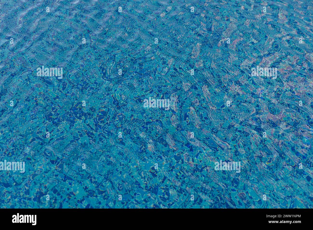Ripple Water in swimming pool with sun reflection 9 Stock Photo - Alamy