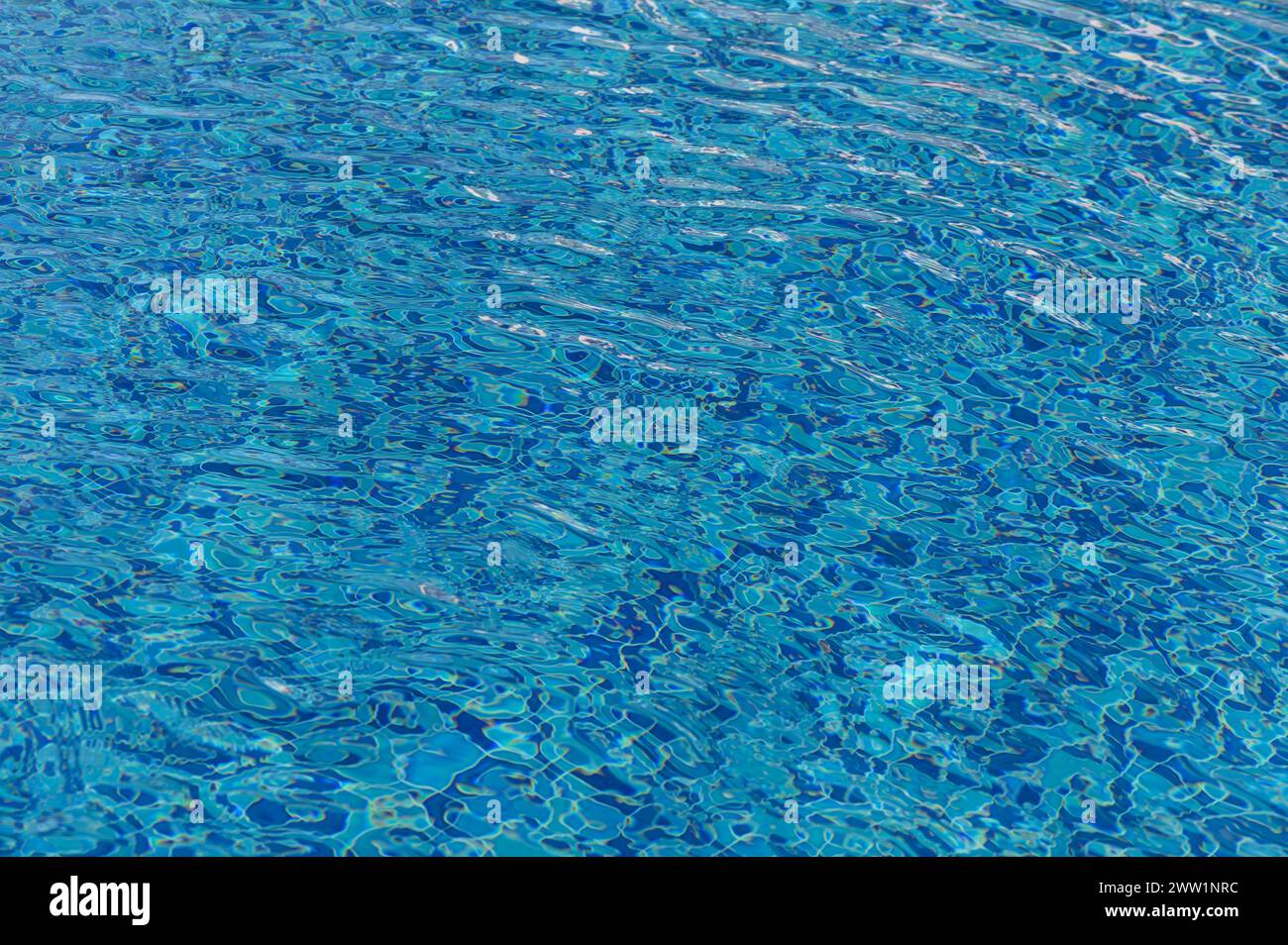 Ripple Water in swimming pool with sun reflection 8 Stock Photo - Alamy