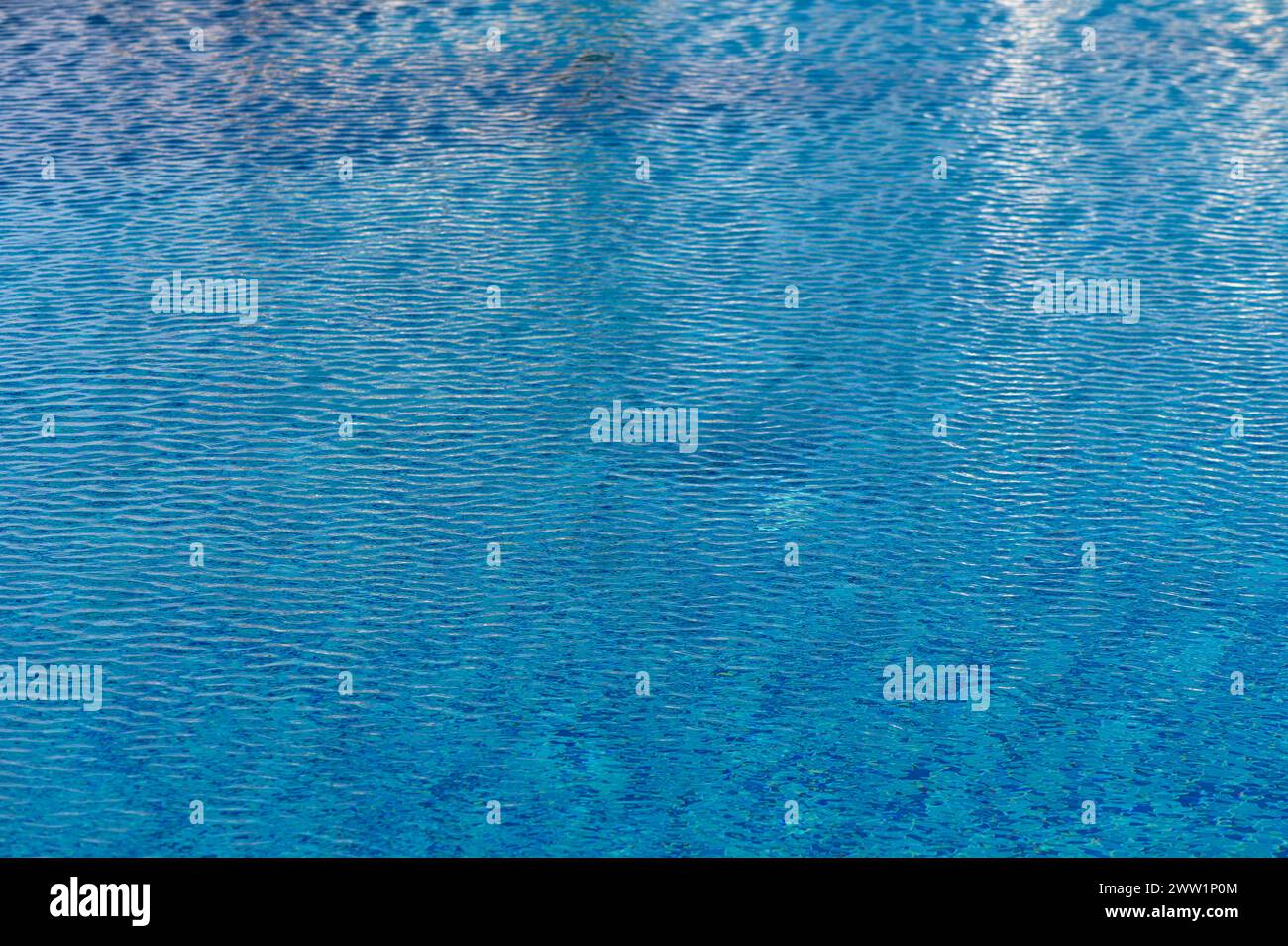Ripple Water in swimming pool with sun reflection 5 Stock Photo - Alamy