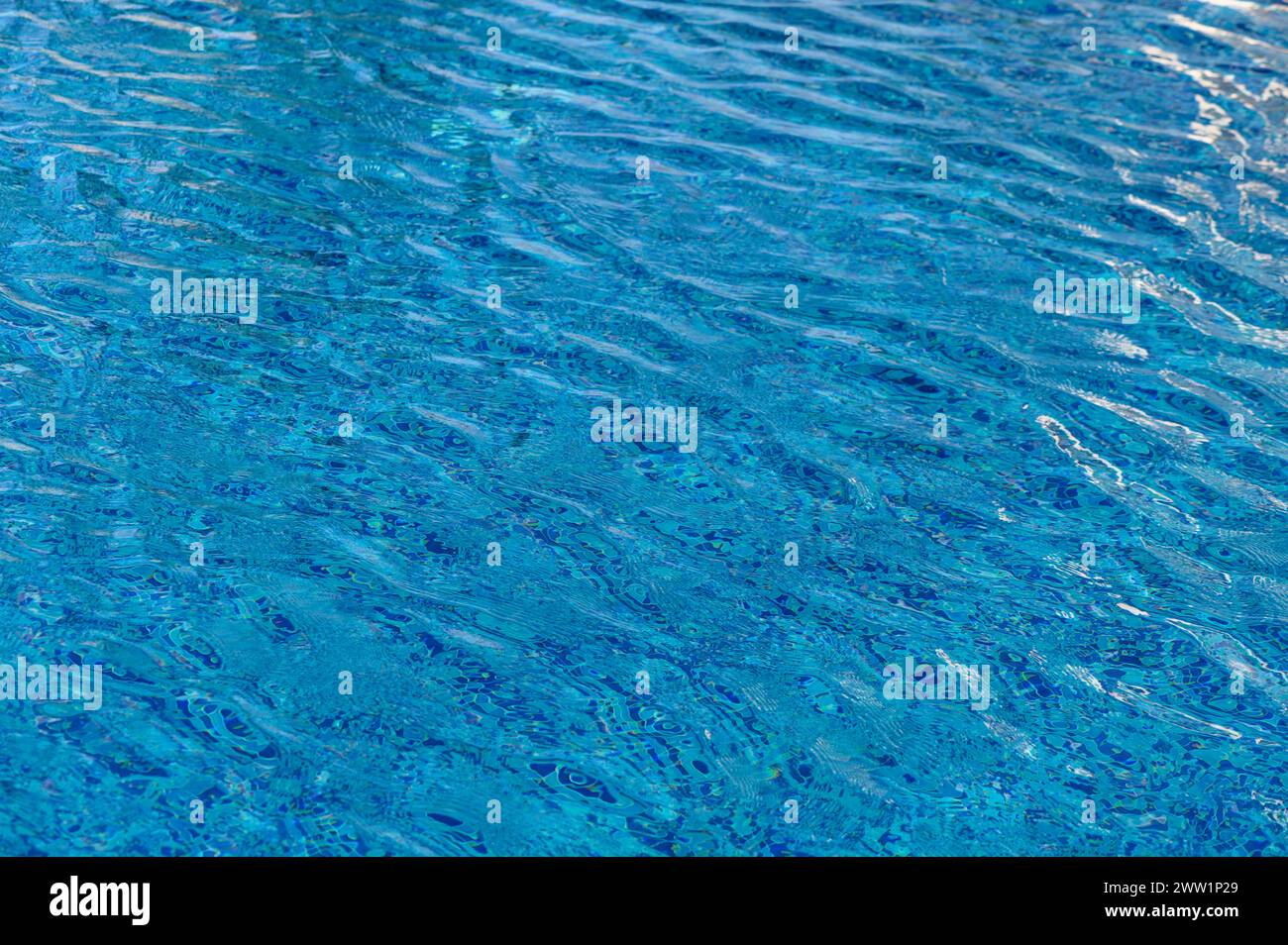 Ripple Water in swimming pool with sun reflection 6 Stock Photo - Alamy