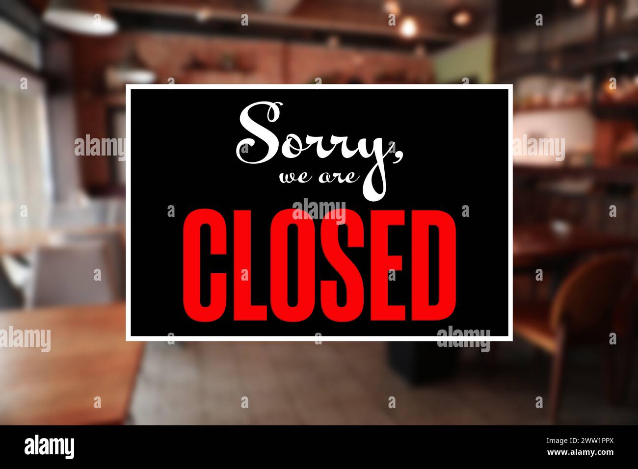 Sorry we are closed sign against blurred background Stock Photo - Alamy
