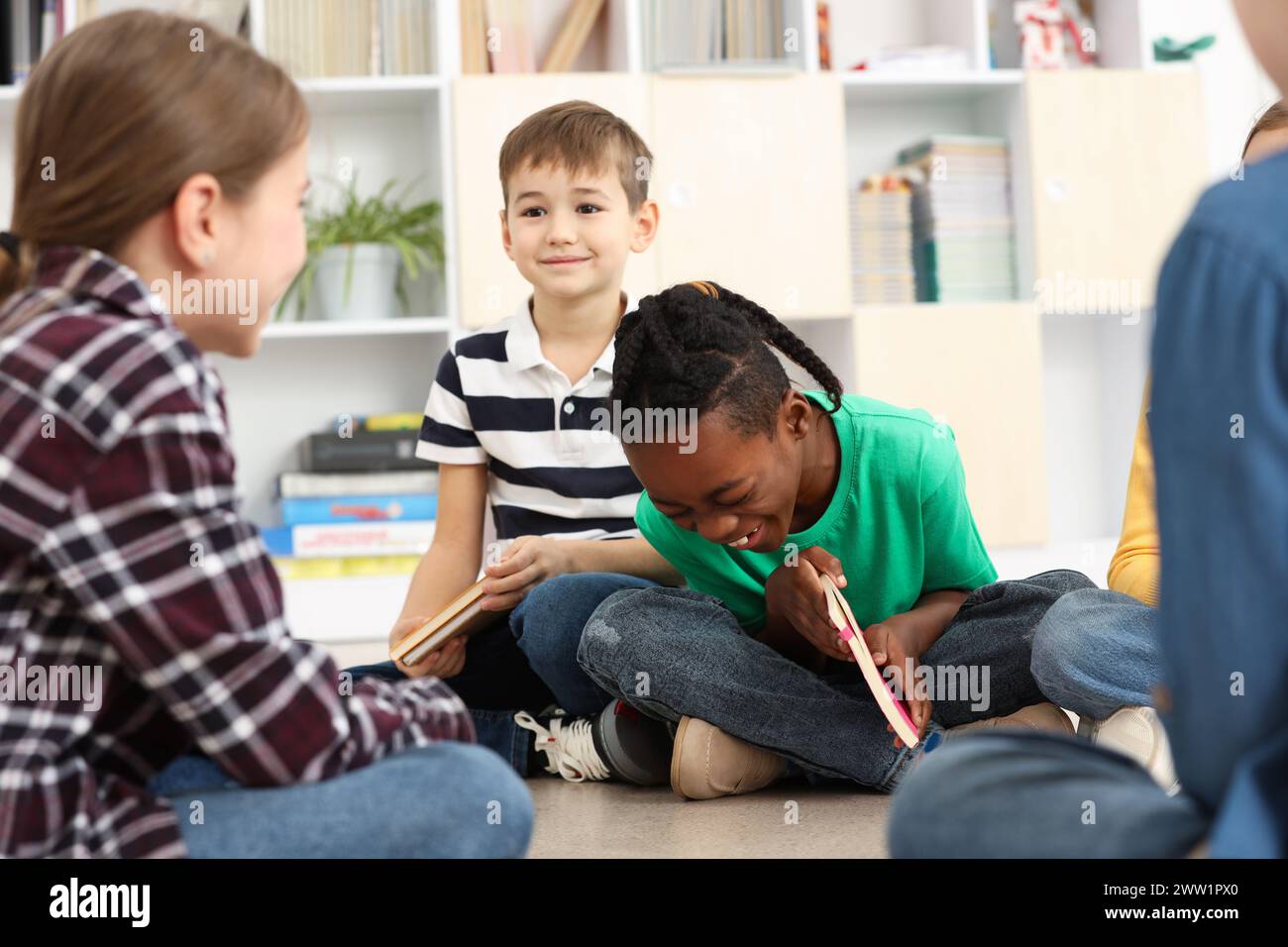 Cute children having fun in classroom at school Stock Photo - Alamy