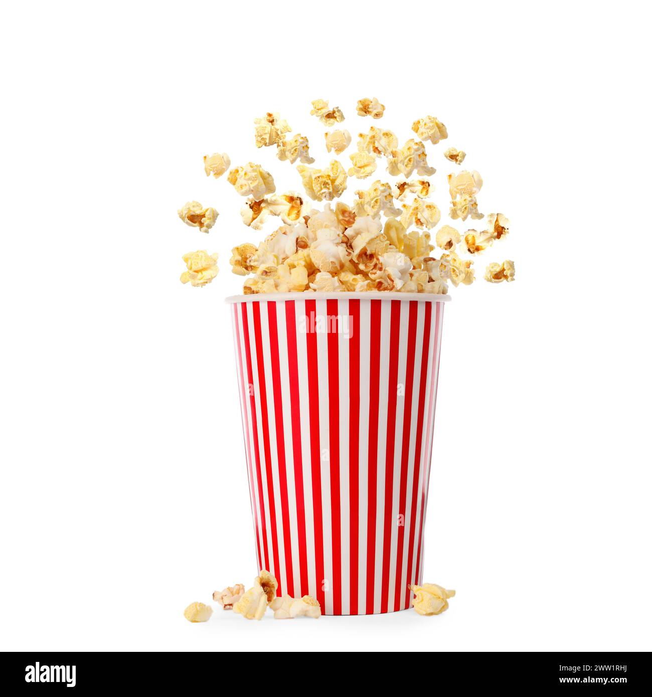 Popcorn flying into bucket on white background Stock Photo - Alamy