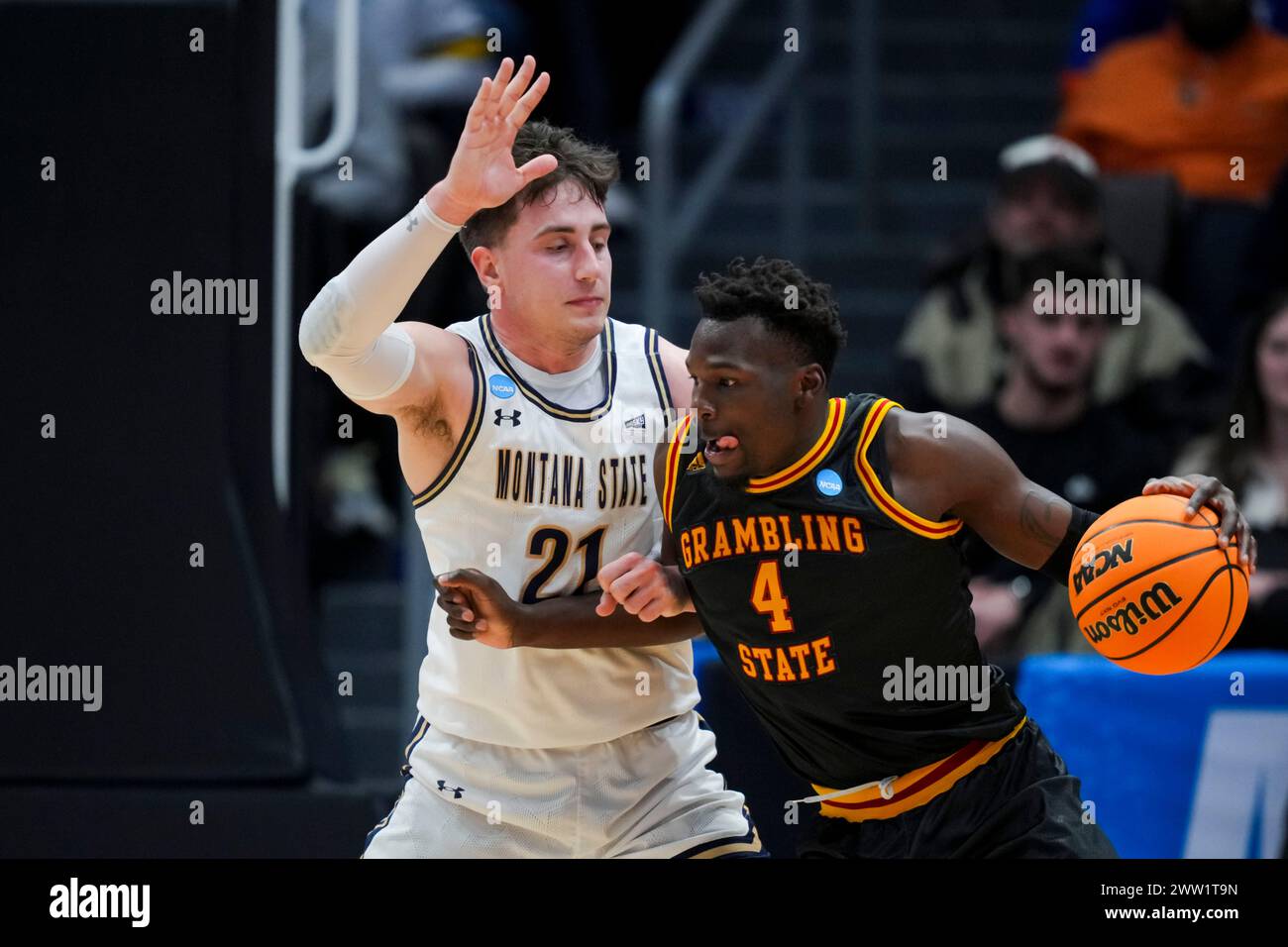 Grambling State forward Antwan Burnett, right, controls the ball as ...