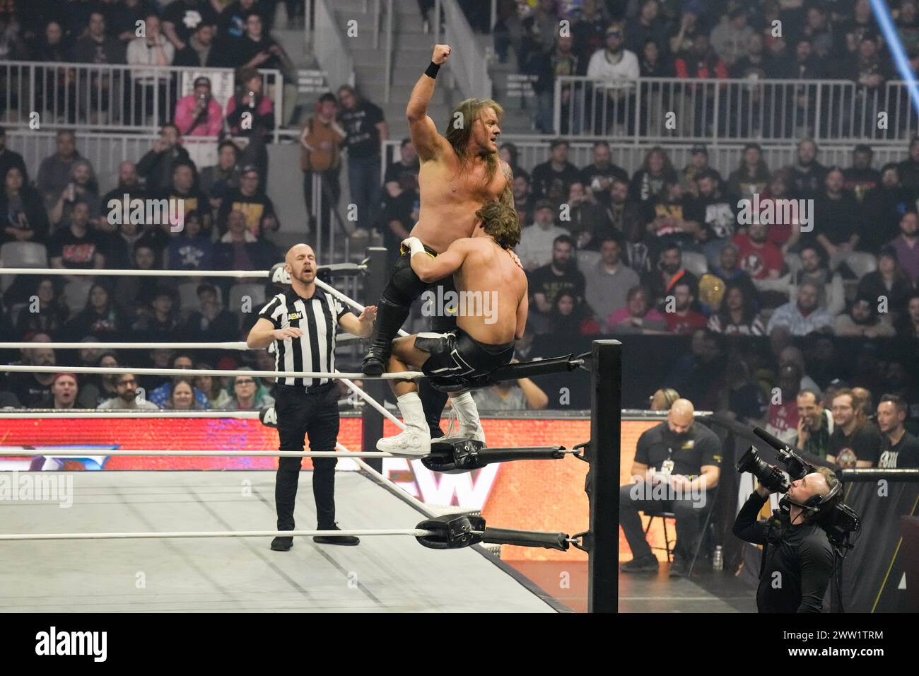 Toronto, Can. 20th Mar, 2024. Winnipeg's Chris Jericho (left) stands on ...