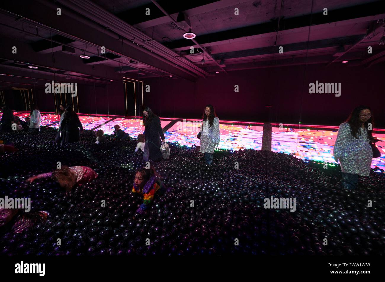 New York, USA. 20th Mar, 2024. Parents and their children play in a ...