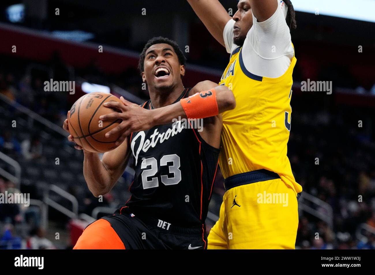Detroit Pistons guard Jaden Ivey (23) is defended by Indiana Pacers ...