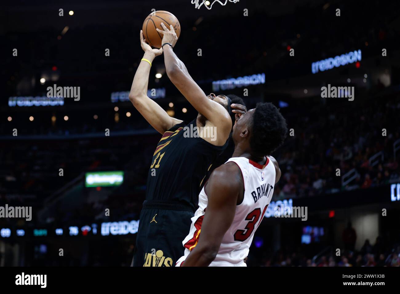 Cleveland Cavaliers center Jarrett Allen, left, shoots against Miami ...