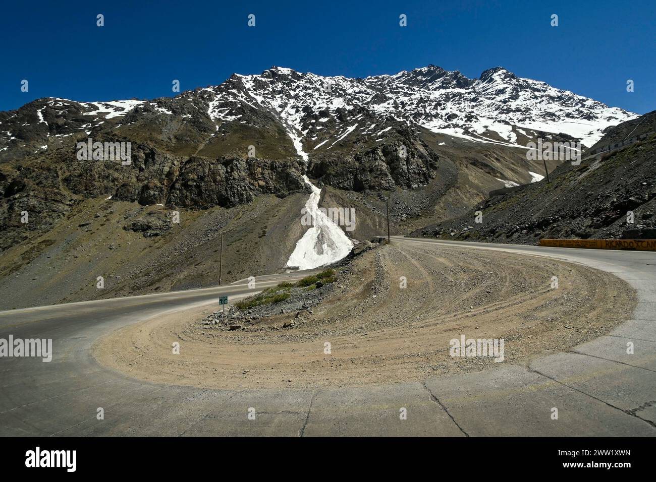 Los Caracoles desert highway, with many curves, in the Andes mountains ...