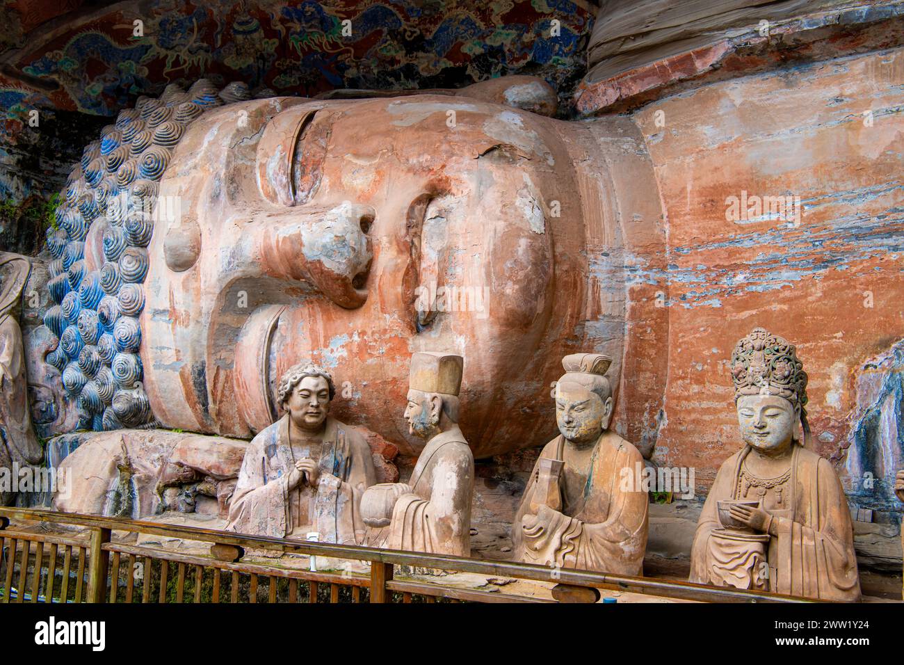 Rock sculpture of the 31m sleeping buddha statue of sakyamuni entering ...