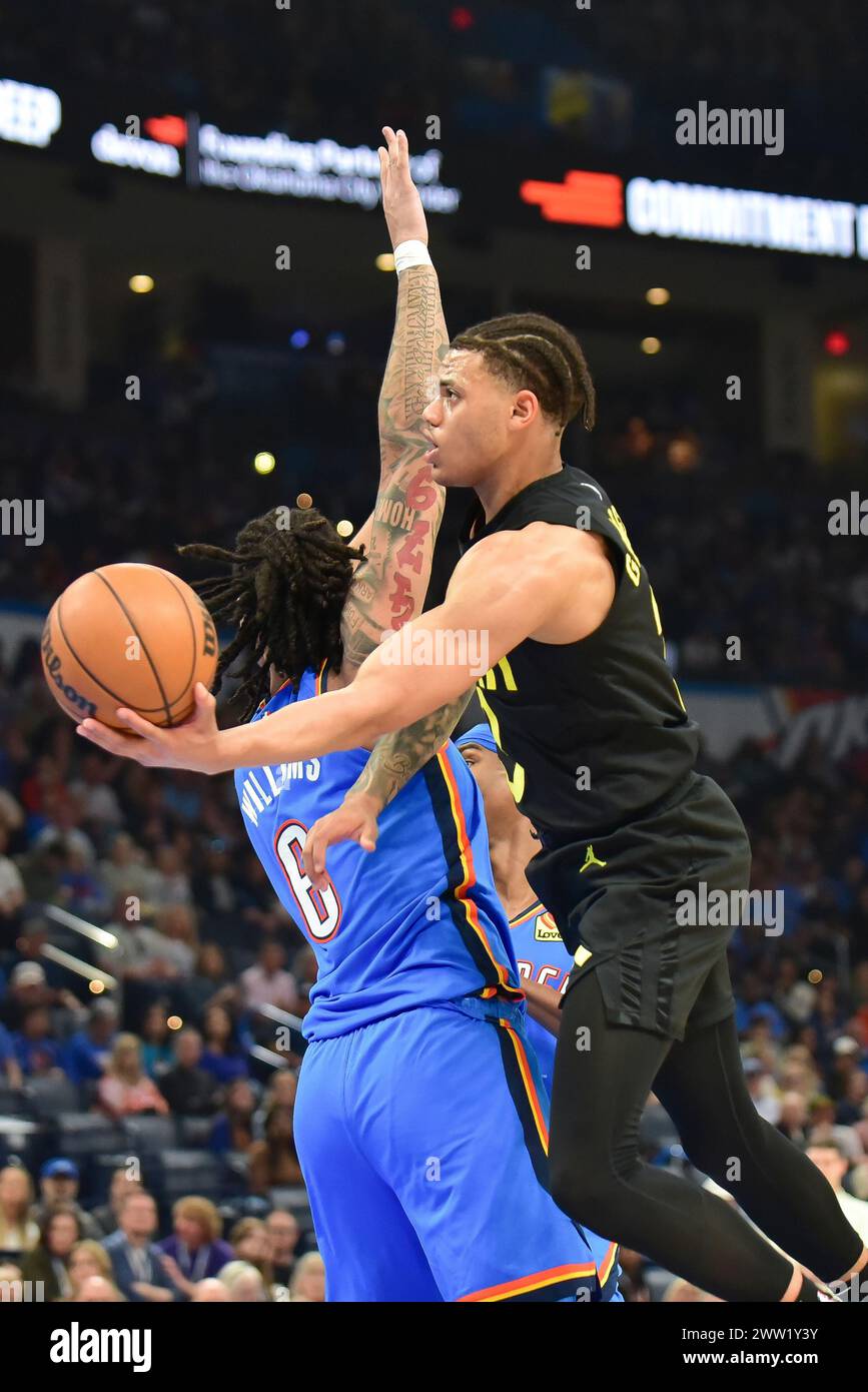 Utah Jazz guard Keyonte George, right, shoots over Oklahoma City ...
