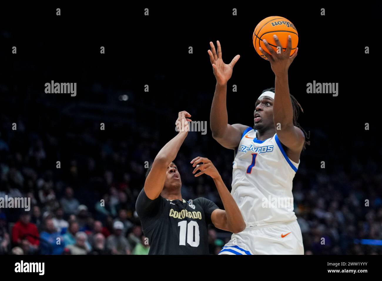 Boise State forward O'Mar Stanley, right, drives to the basket against ...