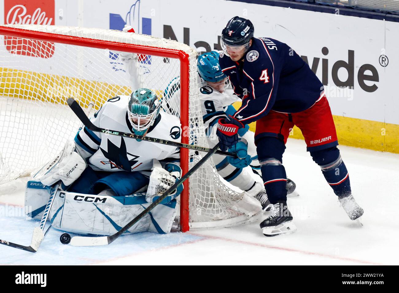 San Jose Sharks goalie Magnus Chrona, left, makes a stop in front of ...