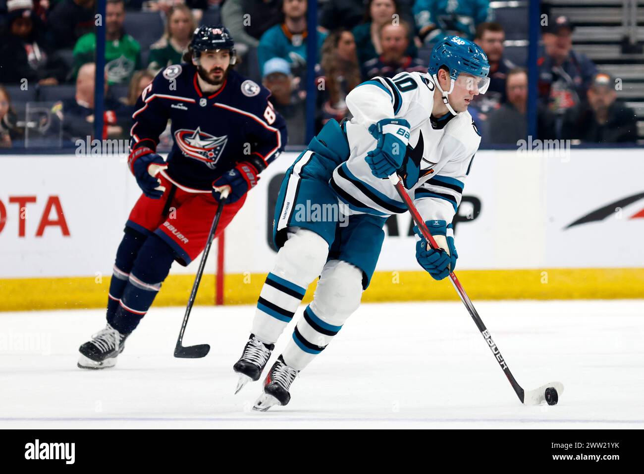 San Jose Sharks forward Klim Kostin, right, controls the puck in front ...