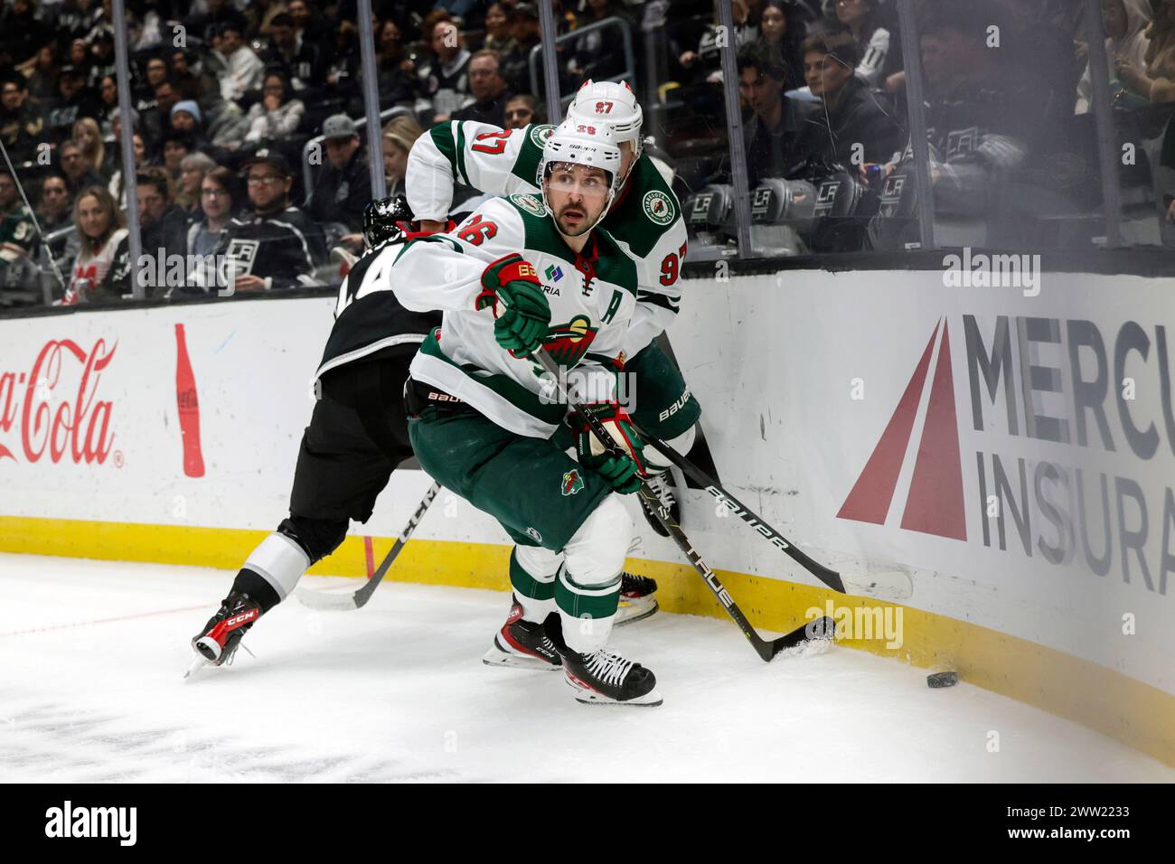 Minnesota Wild right wing Mats Zuccarello (36) moves the puck as Los ...