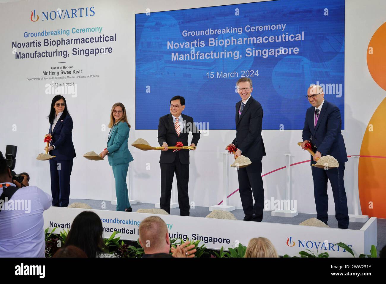 Singapore's Deputy Prime Minister Heng Swee Keat (centre) at the ground ...