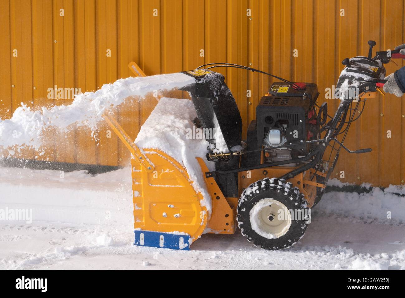 Snow blower effectively removes snow that accumulated on city streets ...