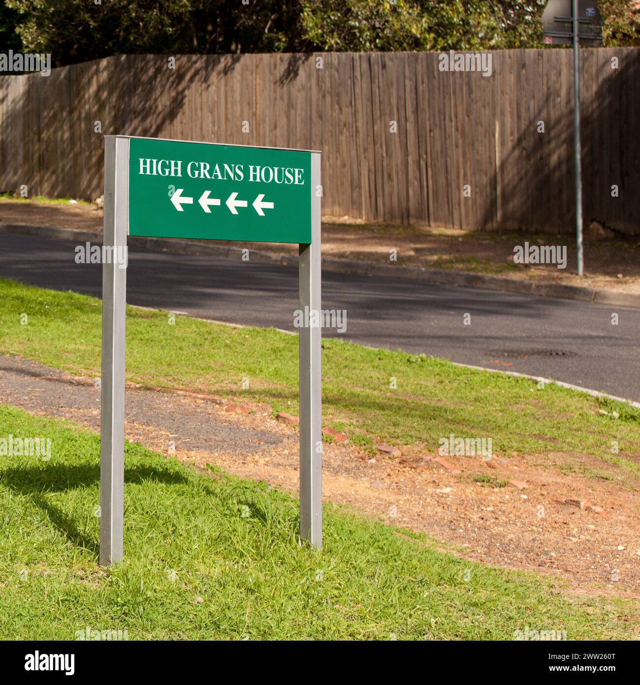 Road sign, arrow and outdoor for direction in neighborhood to search ...
