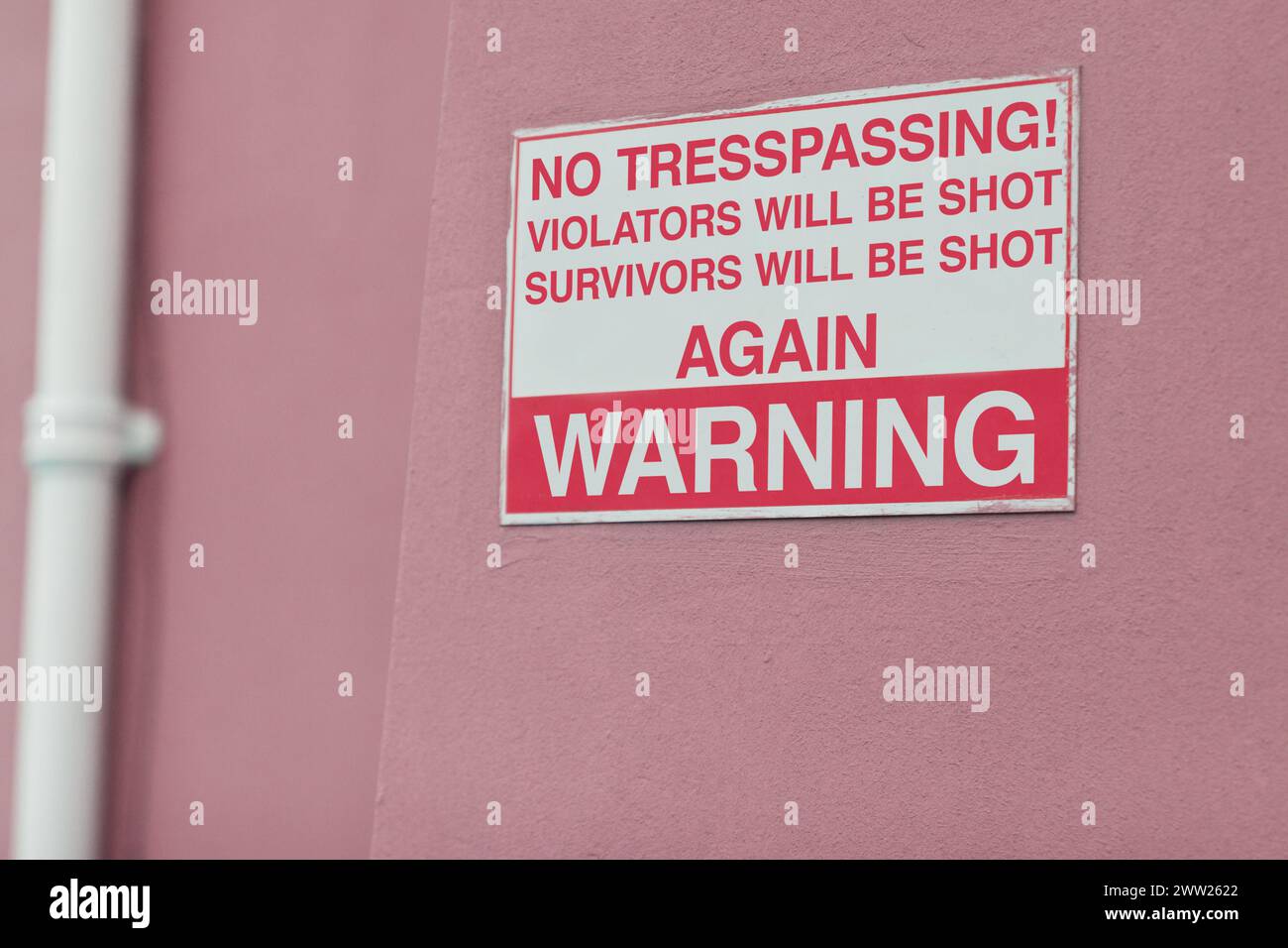 Comic, warning and sign on wall of property for caution, funny ...