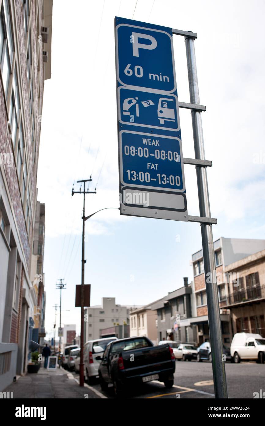 Road sign, warning and signage in street for parking with caution ...